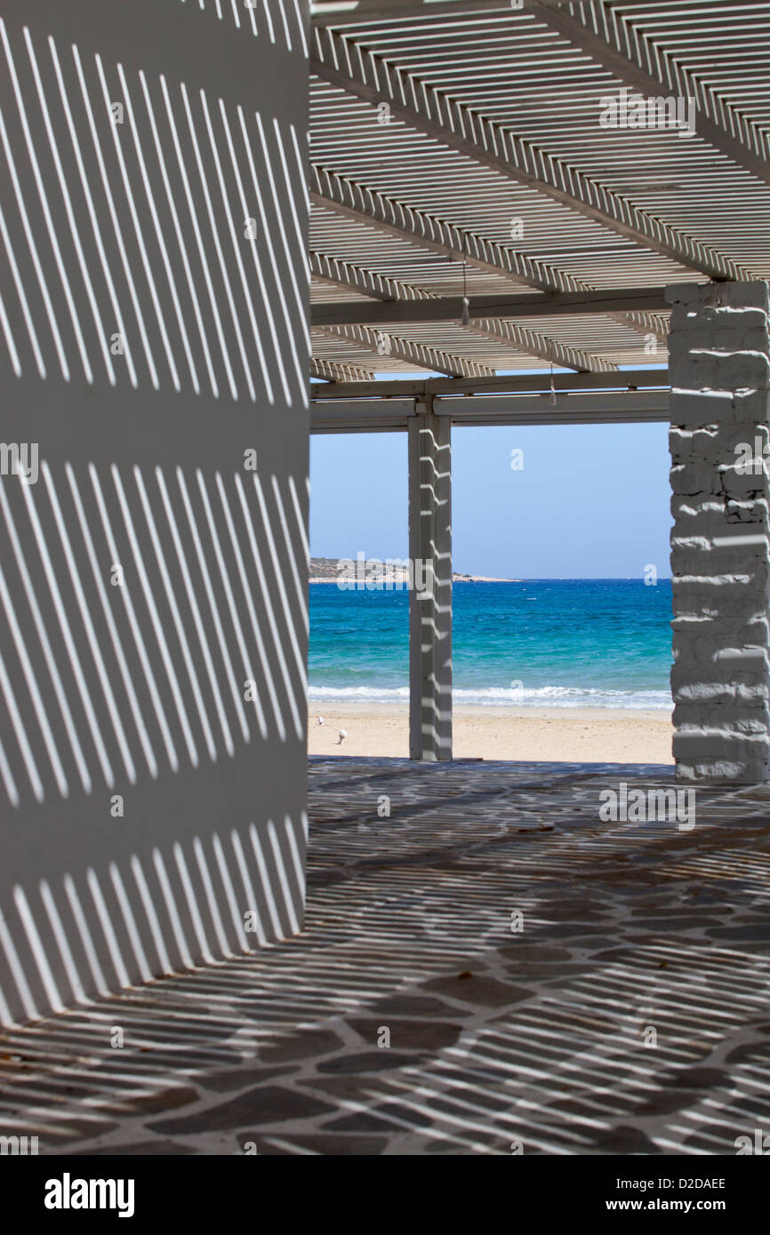 Play of light and shadow in beach shelter Stock Photo - Alamy