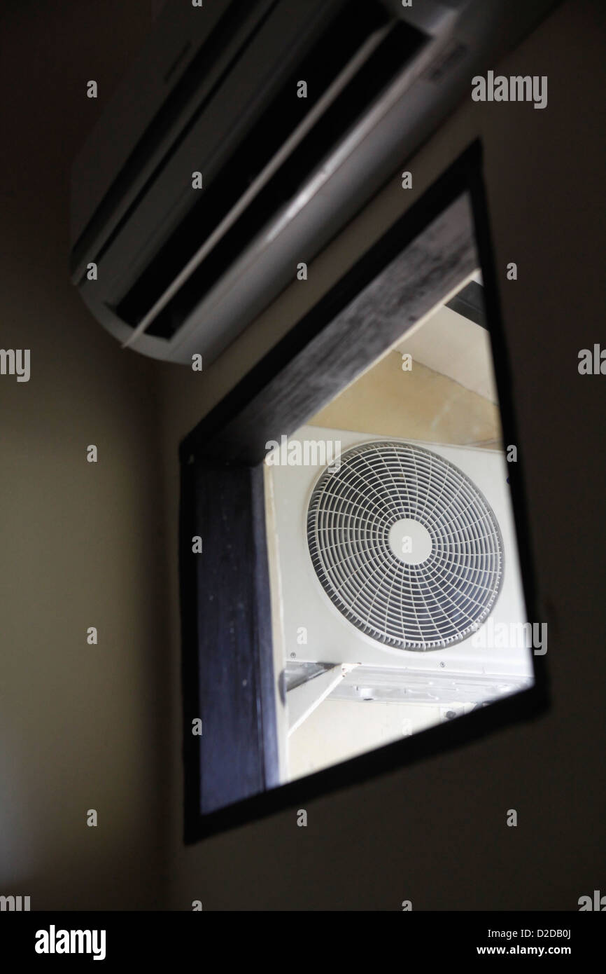 An electric fan seen through a window, low angle view Stock Photo - Alamy