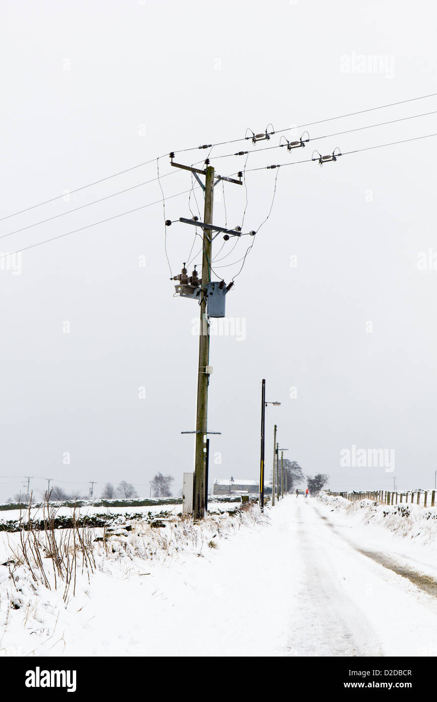 Electricity pylons covered in snow hi-res stock photography and images ...