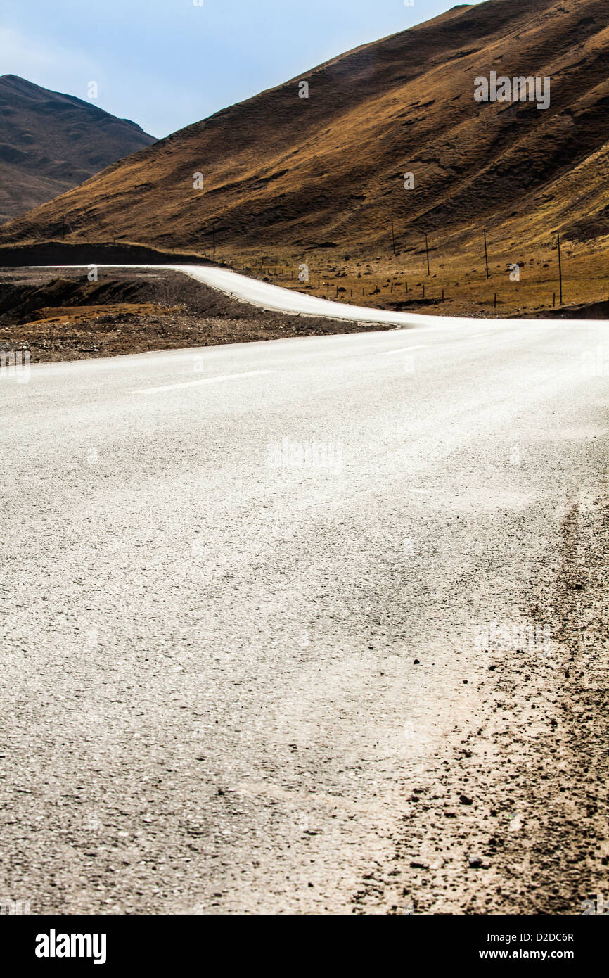 Road going through wilderness area into Qilian Mountain in Qinghai ...