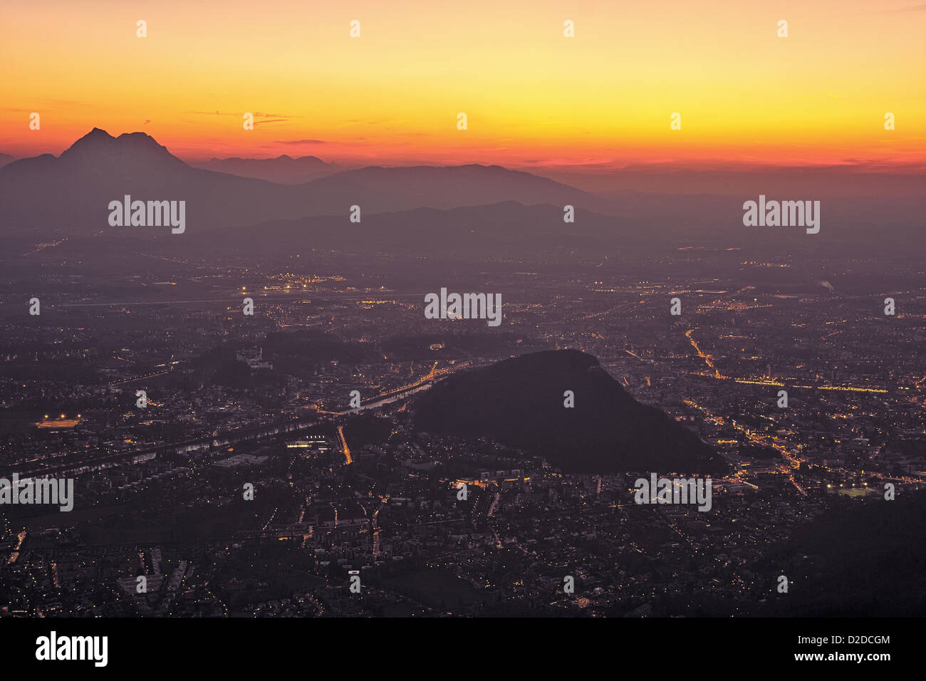 Aerial view of lit up city landscape Stock Photo - Alamy