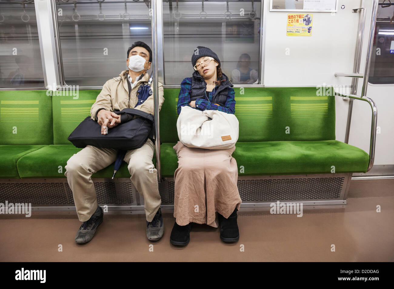 Japan, Honshu, Kanto, Tokyo, Sleeping Passengers on Subway Train Stock ...
