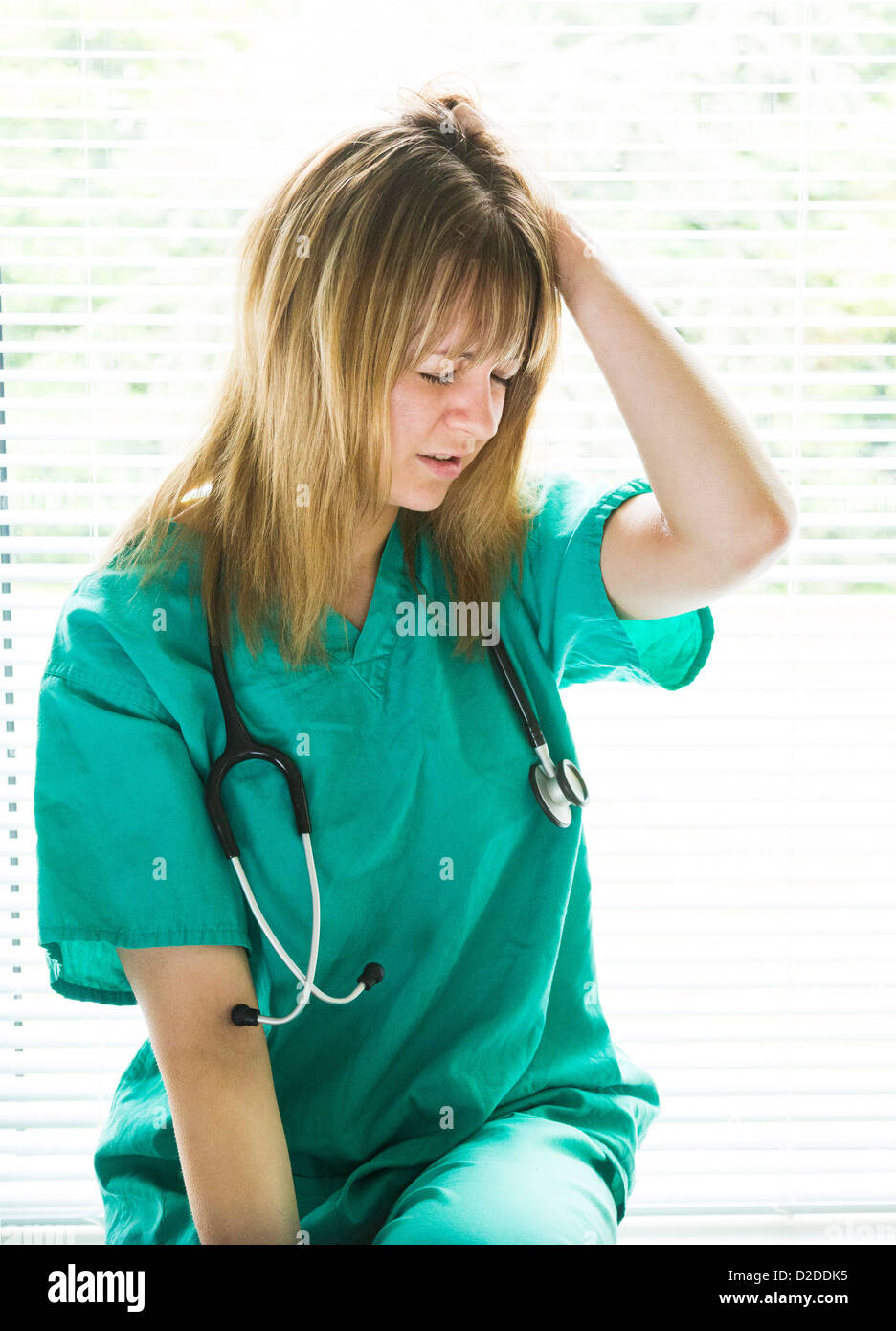 Nurse Looking Stressed High Resolution Stock Photography and Images - Alamy