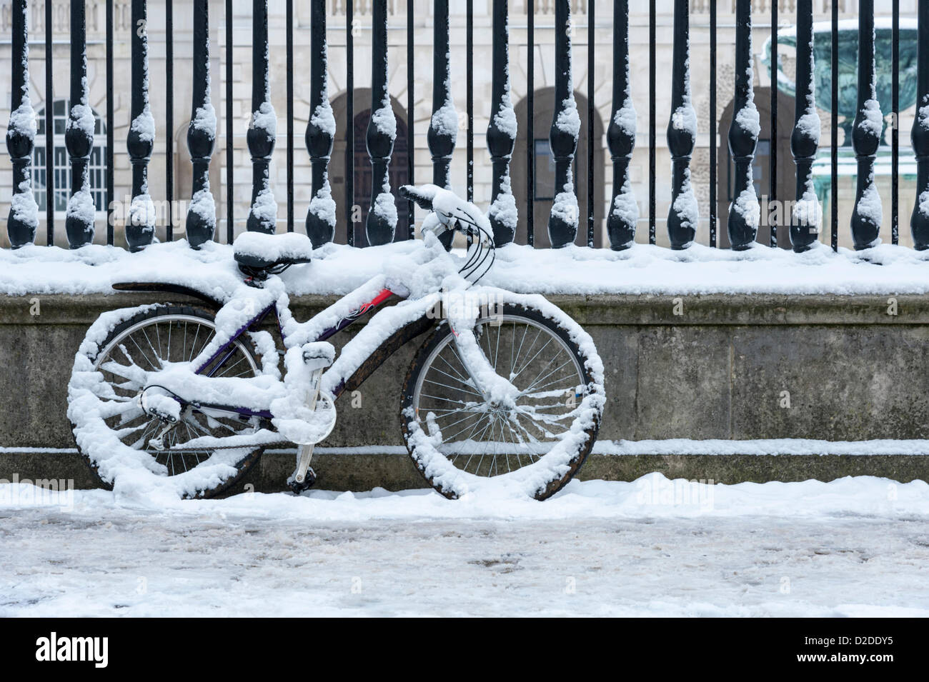 Cambridge, UK. 21st January, 2013. A cycle is covered in snow in ...