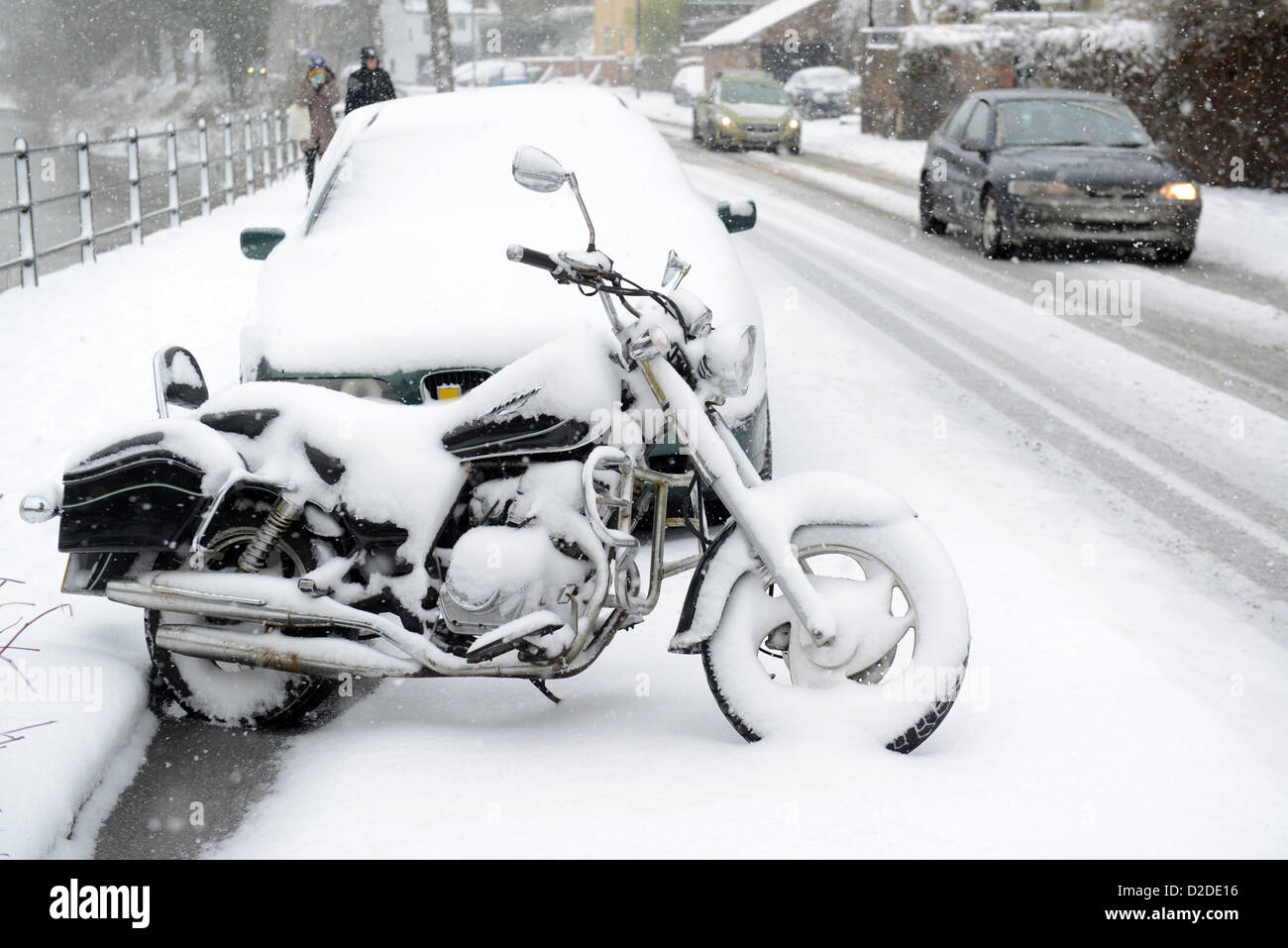 Motorbike covered in snow Uk. winter snowing roads road Britain weather ...