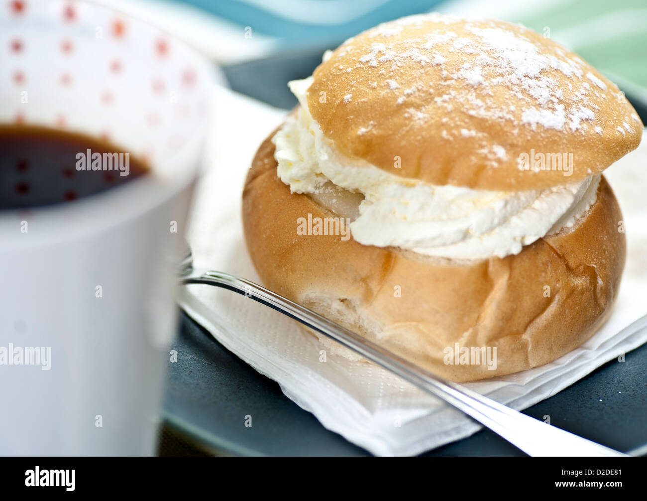 A traditional swedish cream bun, semla, and a cup of coffee Stock Photo ...