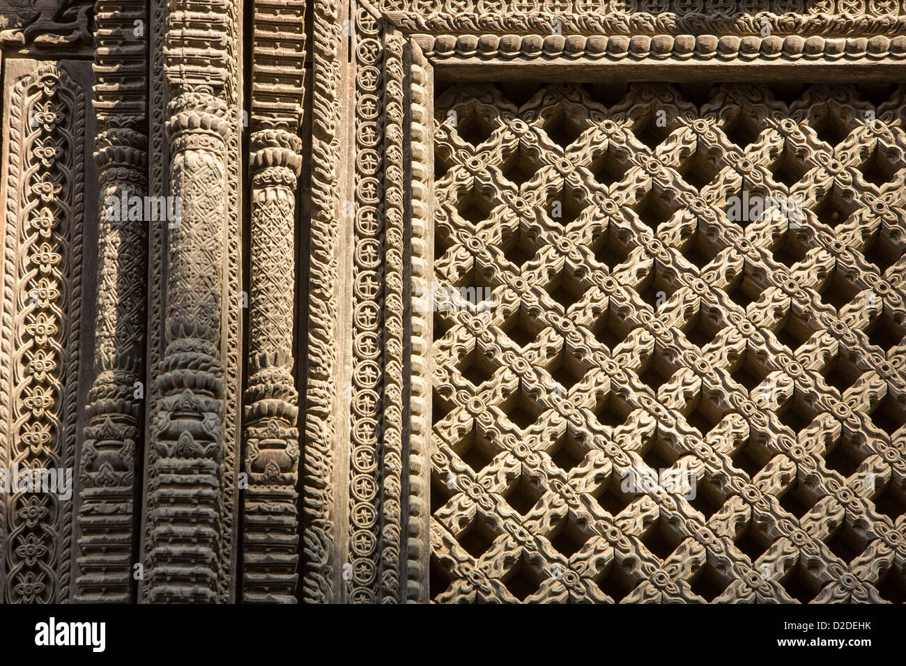 Ancient, ornately carved wood window frames on an old building in ...