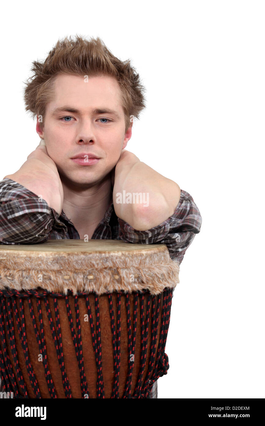 Man posing with his djembe Stock Photo - Alamy