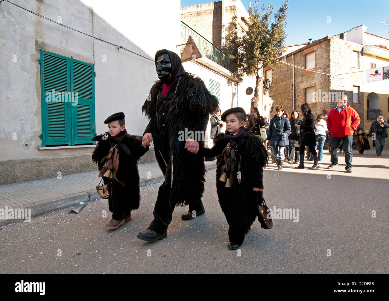 Mamuthones masks on the street at the Mamoiada traditional Carnival ...
