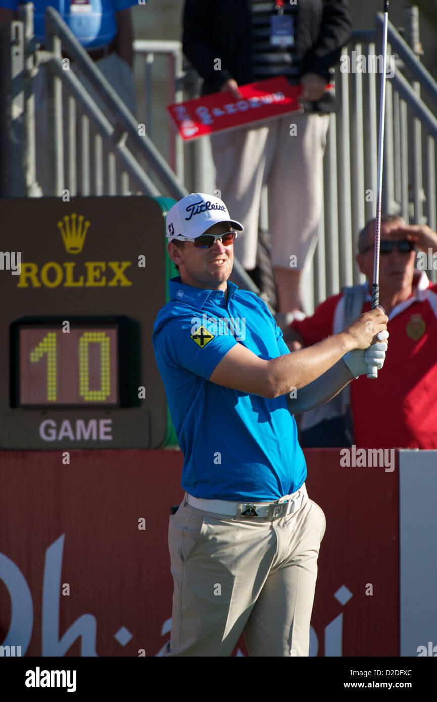 golf player finishing swing Stock Photo - Alamy