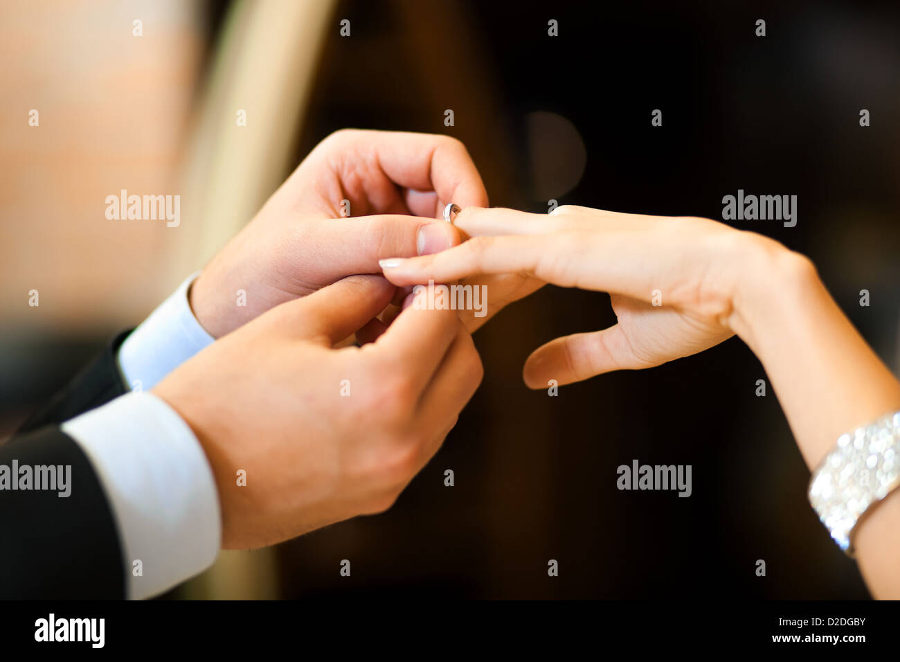 Man giving an engagement ring to his girlfriend Stock Photo - Alamy