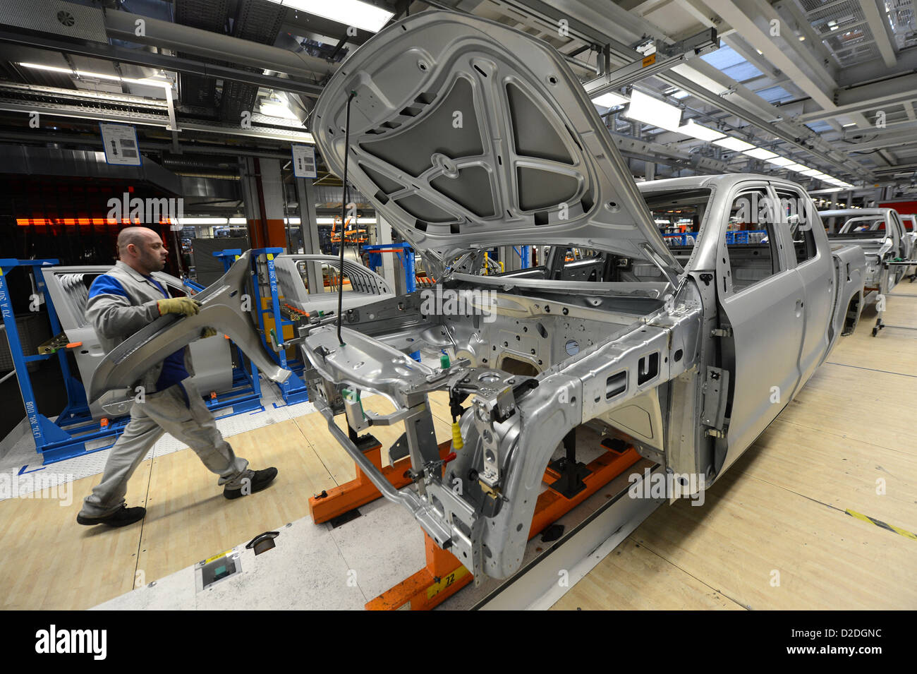 VW employees are working at a production line for the Amarok, on 14 ...