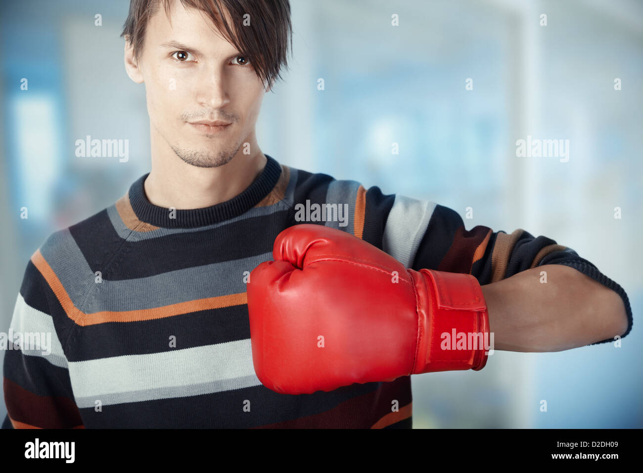 Man at the office with boxing glove. Horizontal photo Stock Photo - Alamy