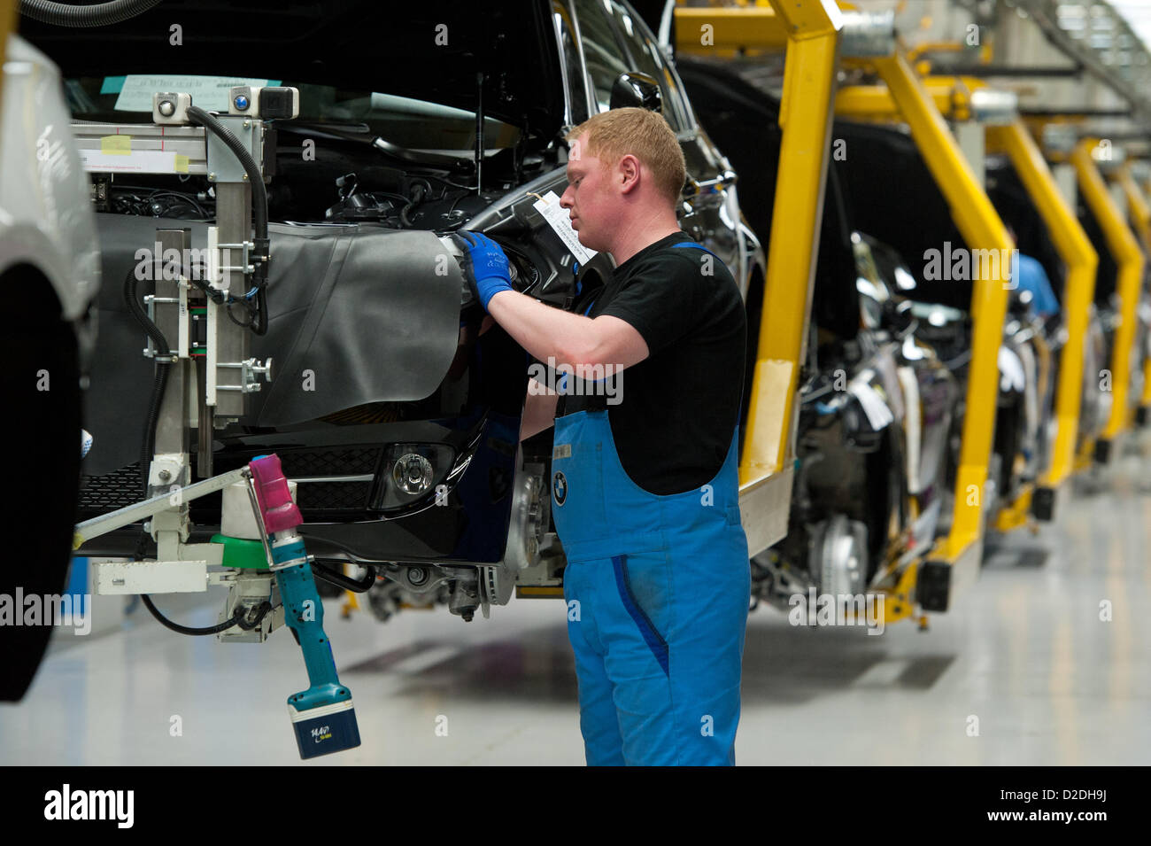 A man is working on a vehicle of the 5 series, on 12 March 2012, at the ...