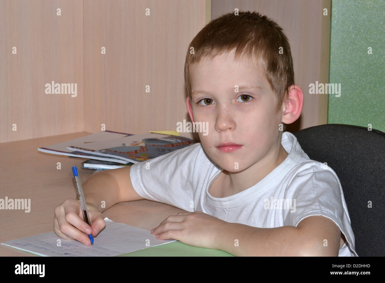 The boy does homework Stock Photo - Alamy