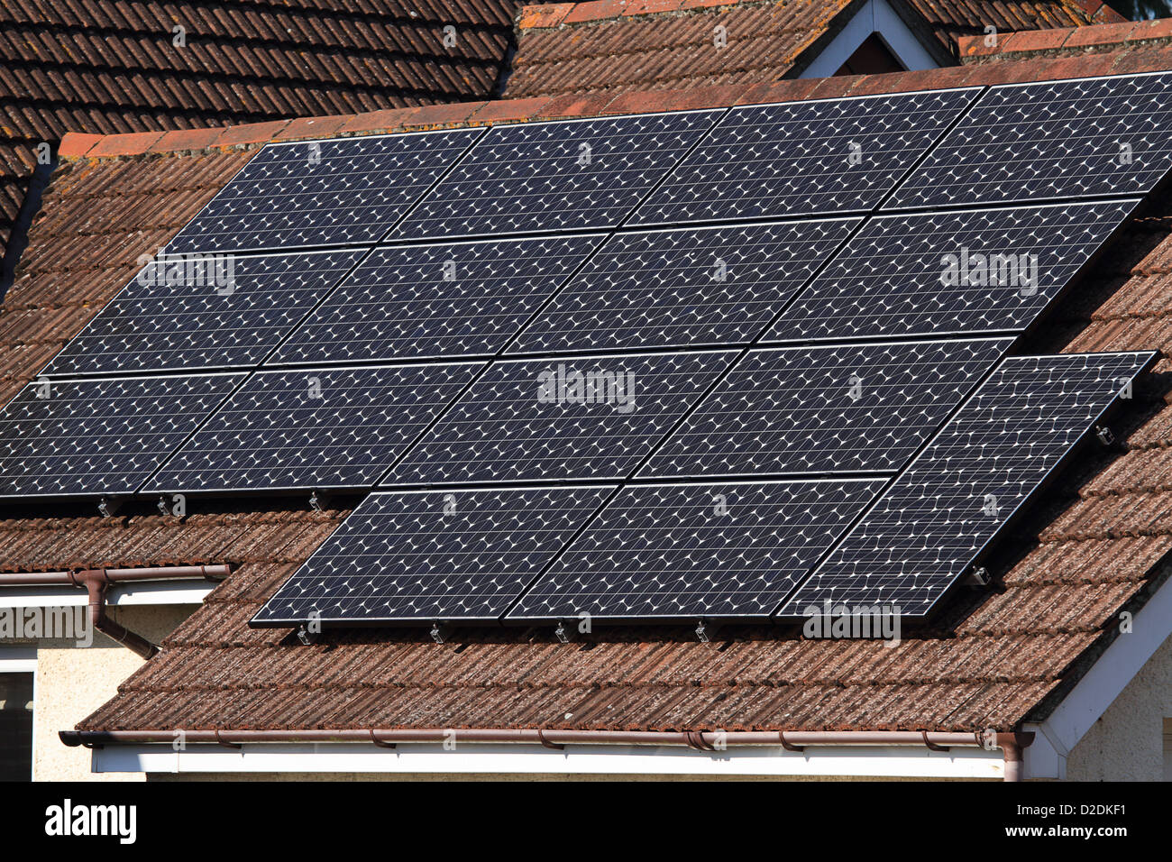 Solar photovoltaic panels on roof Stock Photo - Alamy