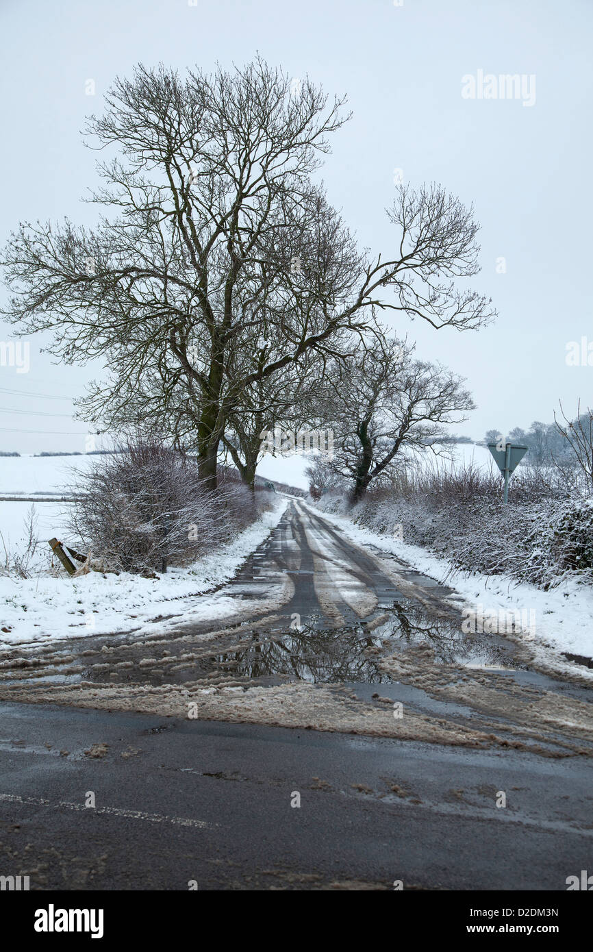 Country lane in winter with snow Stock Photo - Alamy