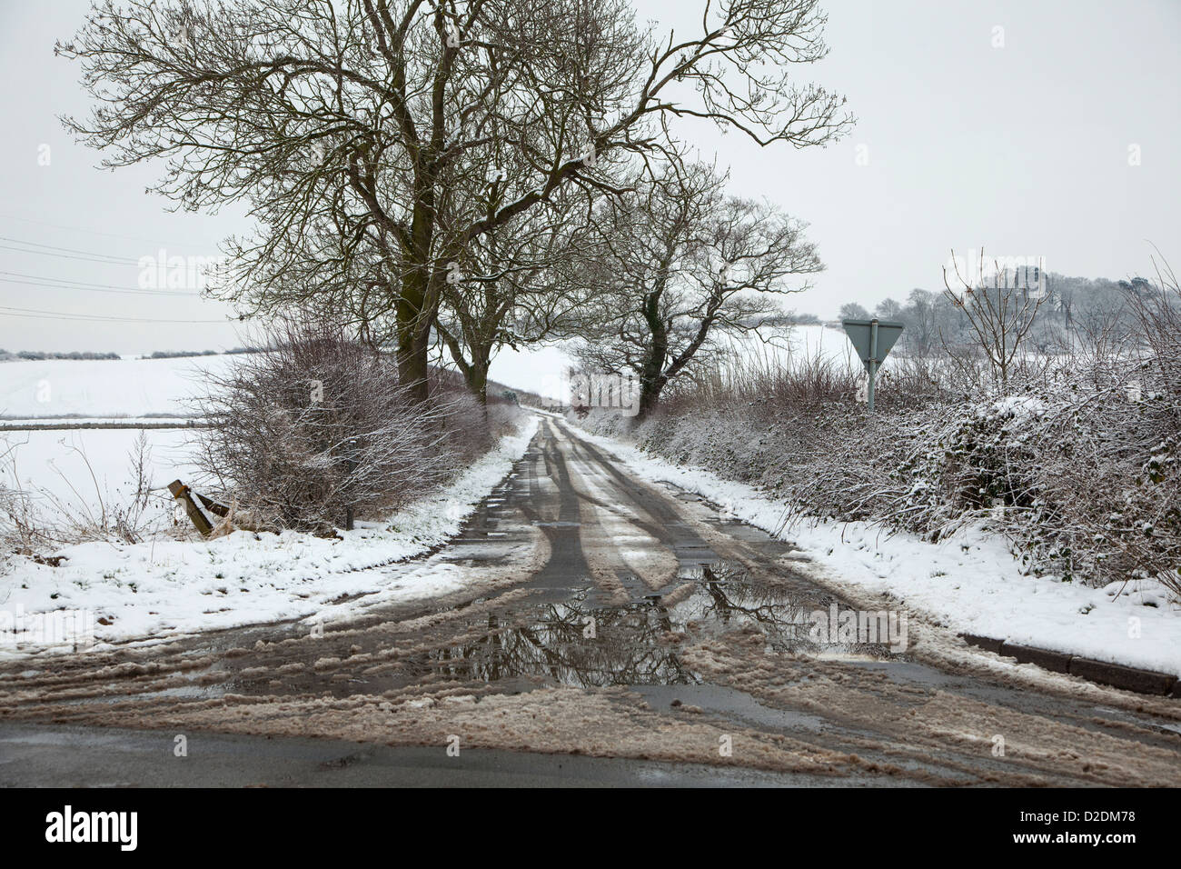 Country lane in winter with snow Stock Photo - Alamy