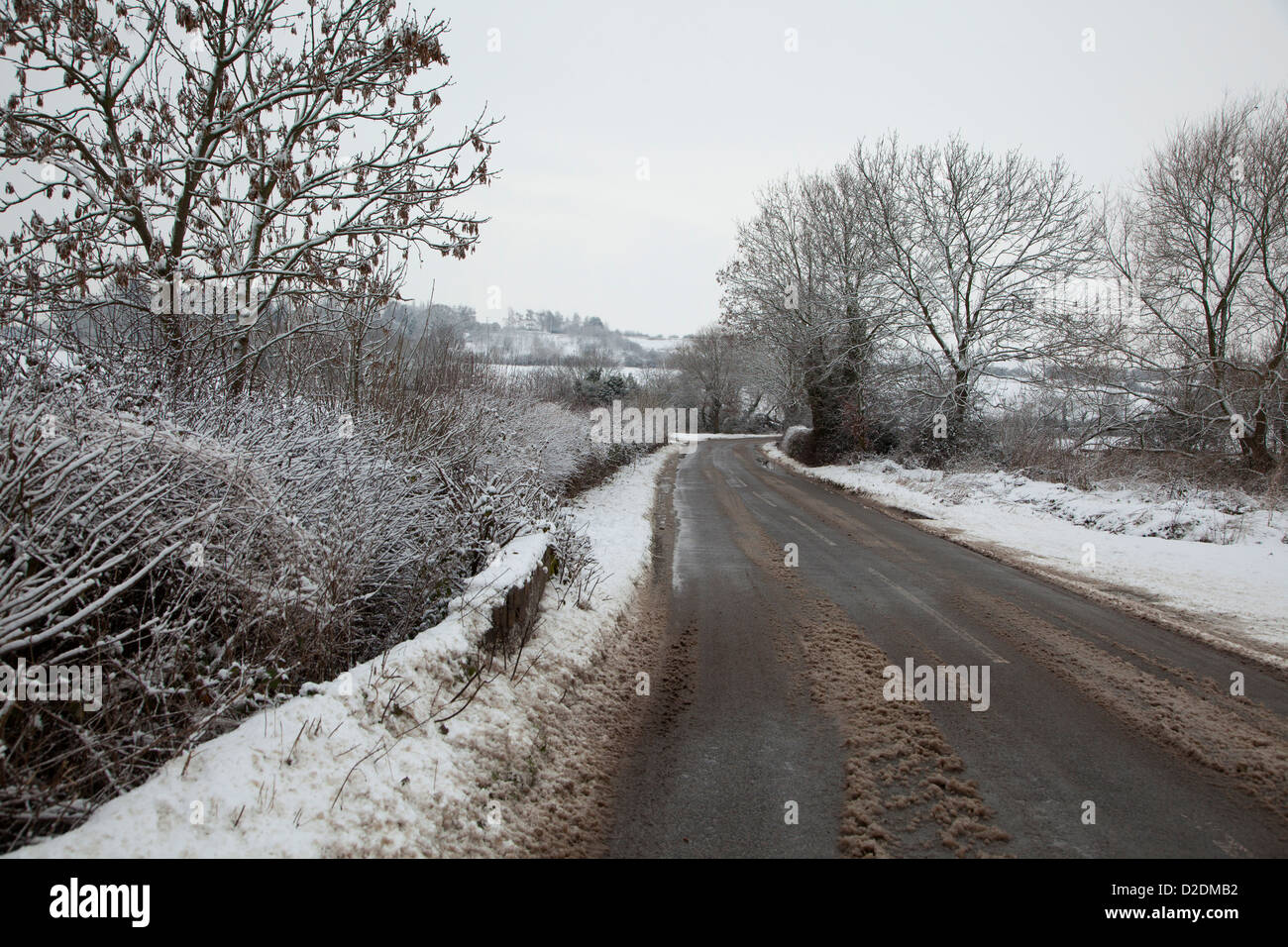 Country lane in winter with snow Stock Photo - Alamy