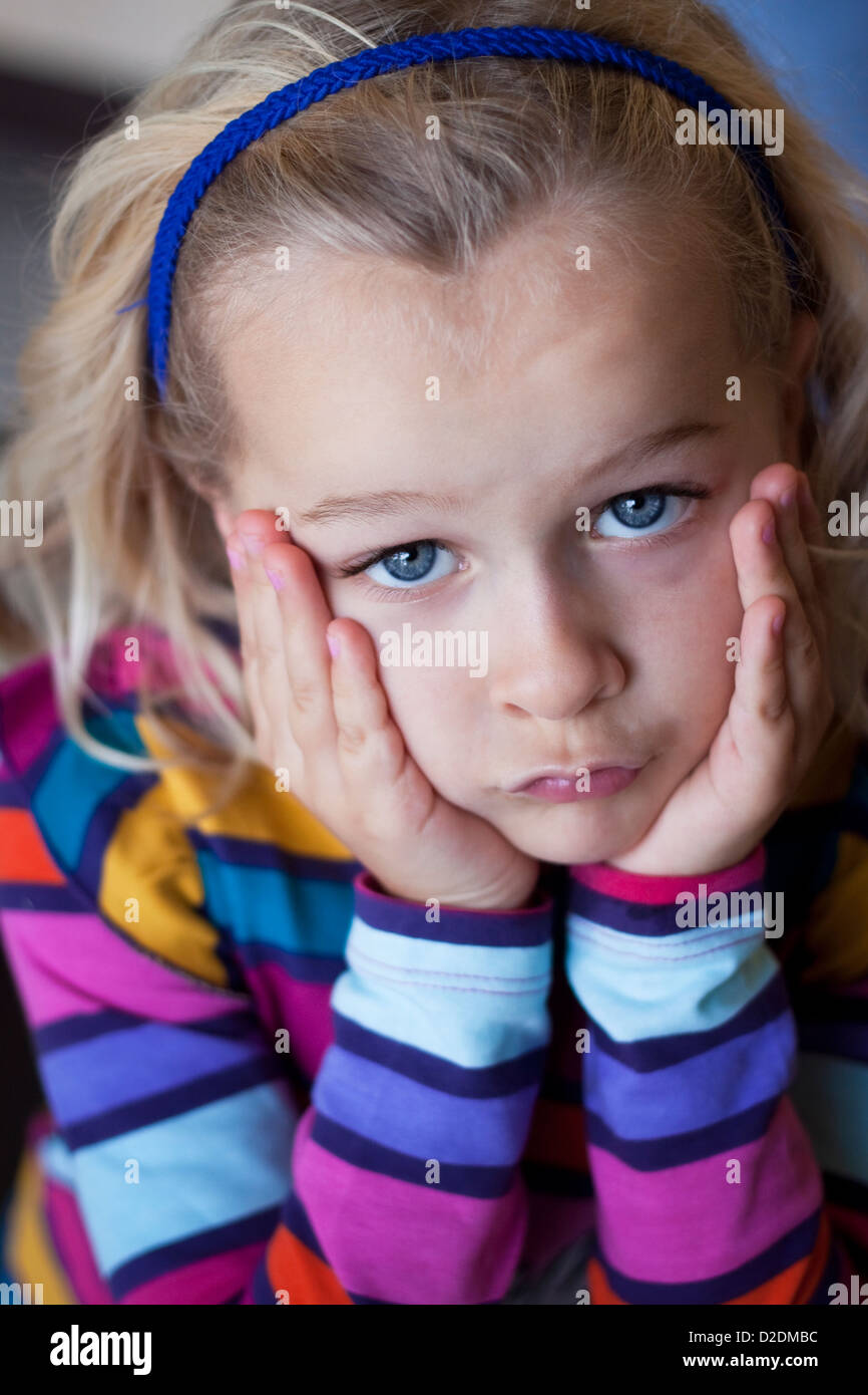 Portrait of child, grumpy and pouting Stock Photo - Alamy