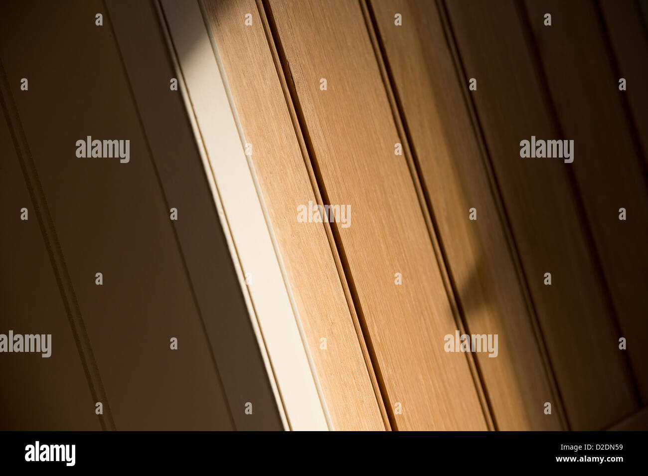 Close up of wooden tongue and groove finish on a wall inside a newly ...