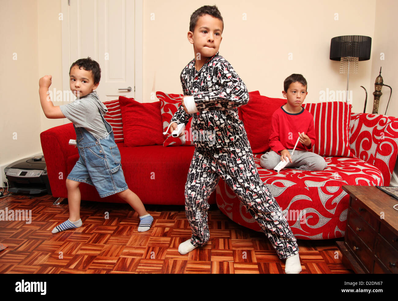 Children playing dancing video game hi-res stock photography and images ...