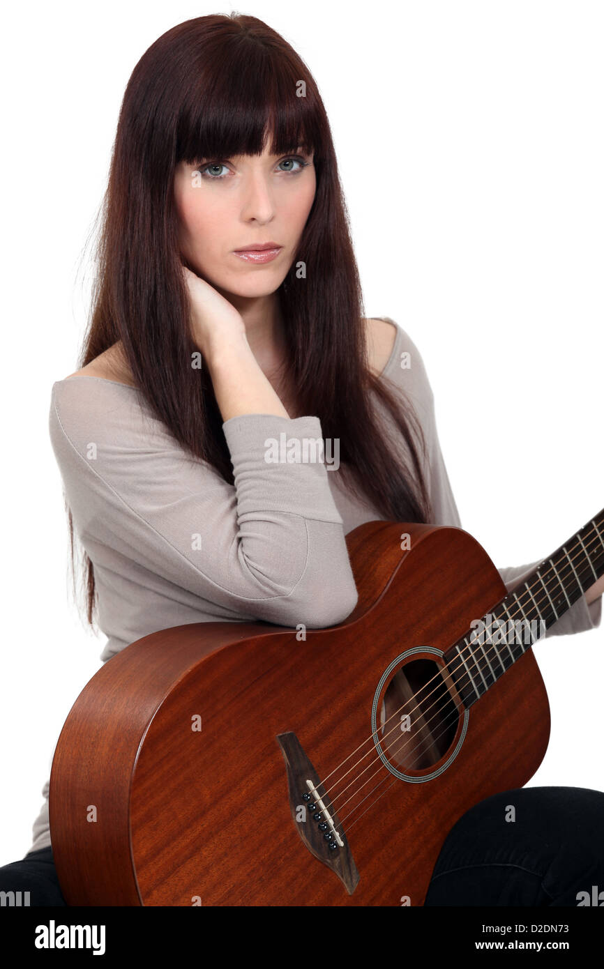 Woman with guitar Stock Photo - Alamy
