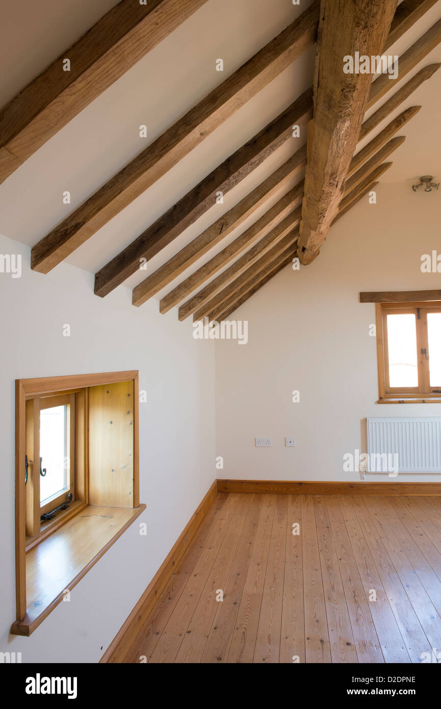 Beautiful old beams in a recently converted barn in rural England Stock ...