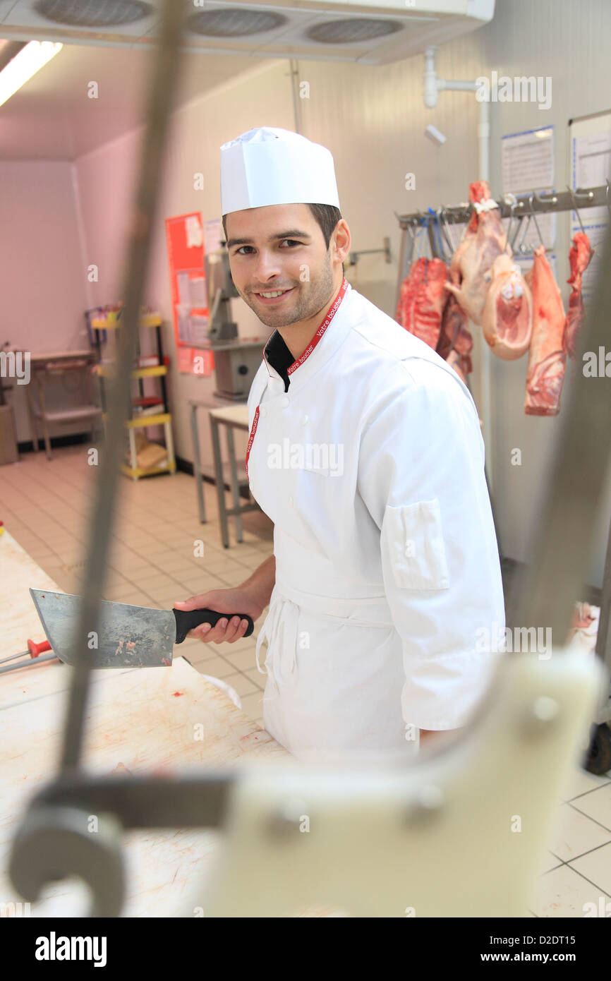 France, supermarket, young butcher Stock Photo - Alamy