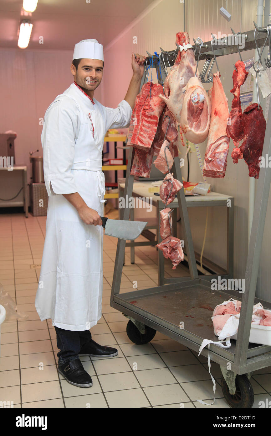 France, supermarket, young butcher Stock Photo - Alamy