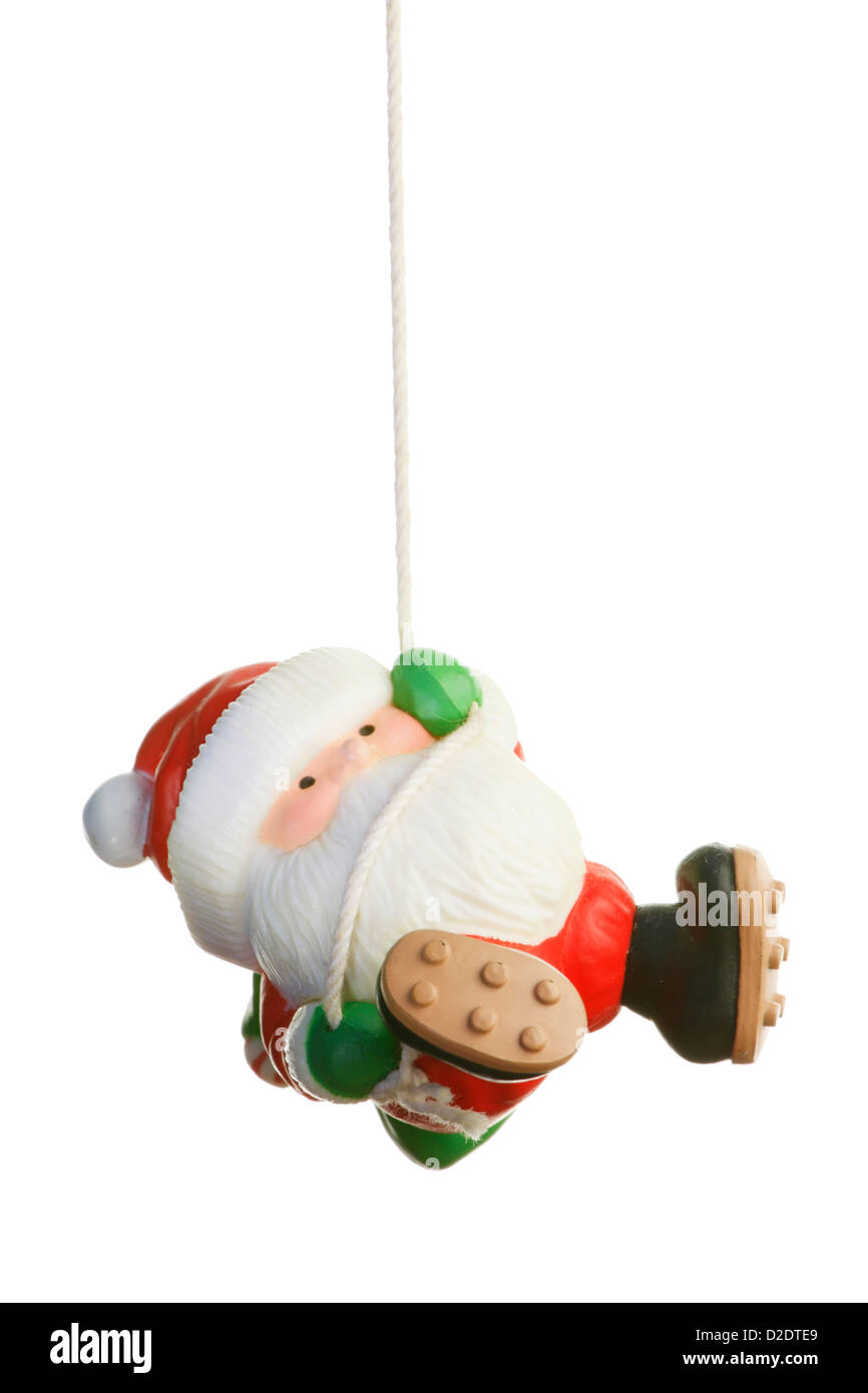 Abseiling Santa Claus Christmas decoration on white background Stock ...