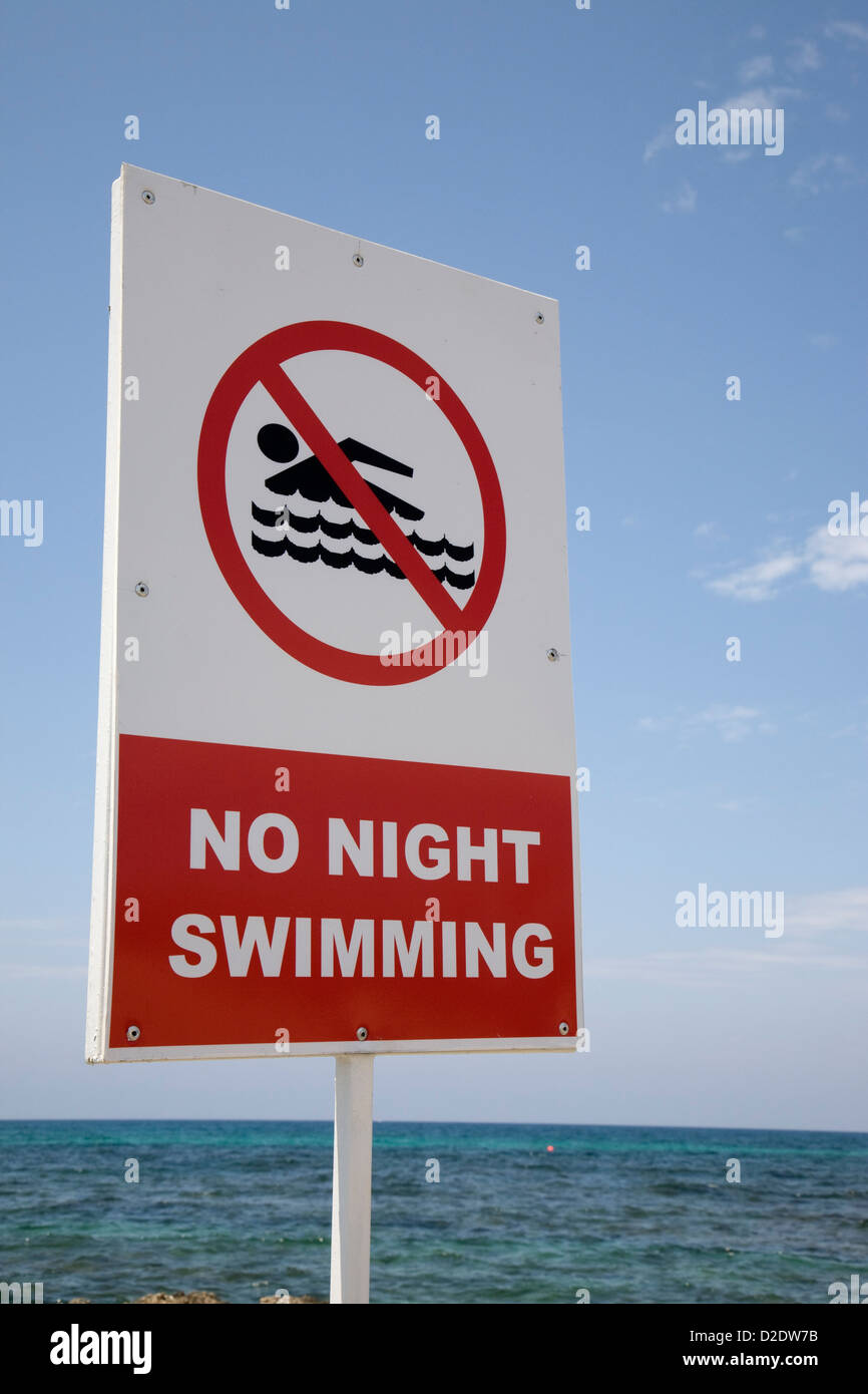 No Night Swimming sign on the beach, Paphos, Cyprus Stock Photo - Alamy