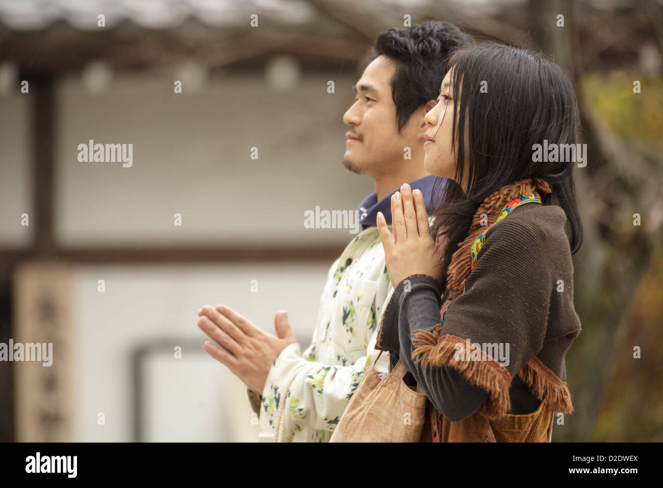 Japanese people praying at the Kurama temple, northen of Kytoto, Japan ...