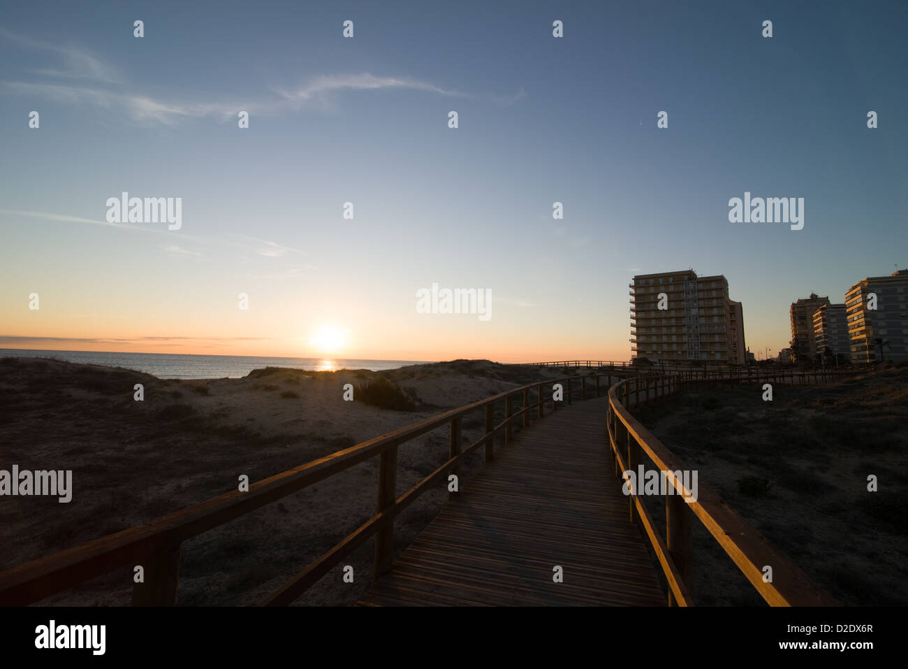 Sunrise on Arenales beach resort, Costa Blanca, Spain Stock Photo - Alamy