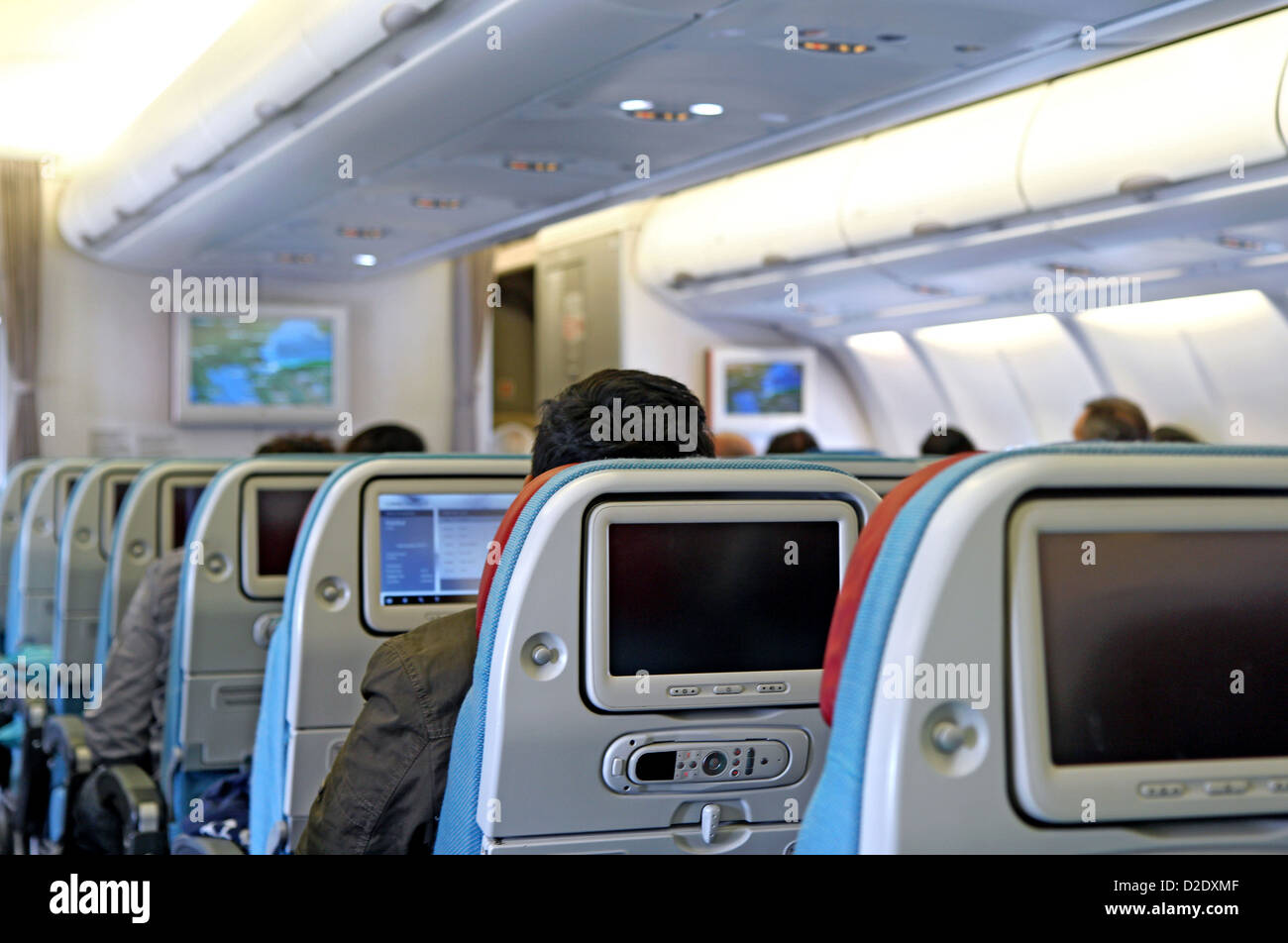 interior of passenger airplane with the seats Stock Photo - Alamy
