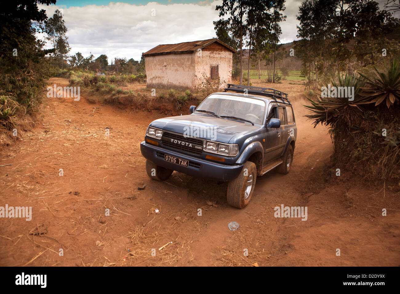 Madagascar, Antsirabe, 4WD Toyota Land cruiser vehicle driving on rough ...