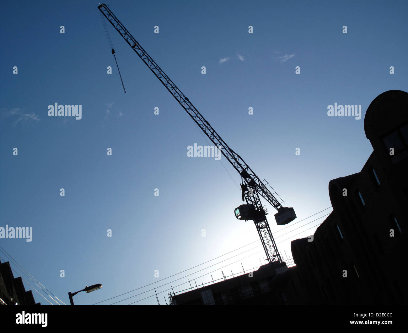 Silhouette of construction jib crane Stock Photo - Alamy