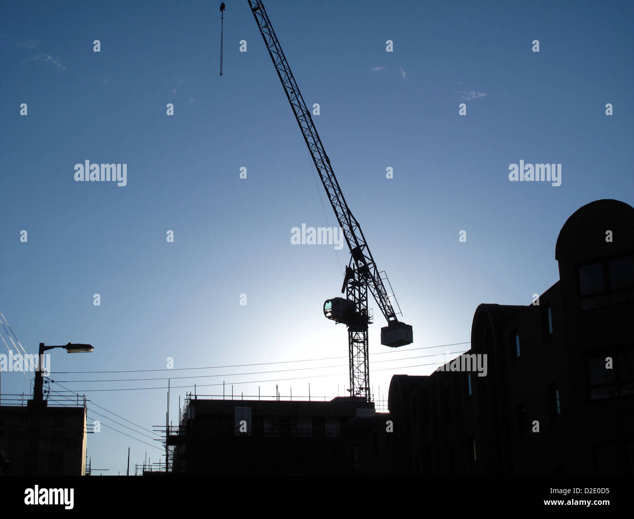 Construction site silhouette crane hi-res stock photography and images ...
