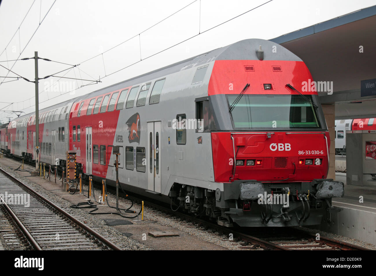 A City Shuttle train on the Austrian Federal Railways, on the side of a ...
