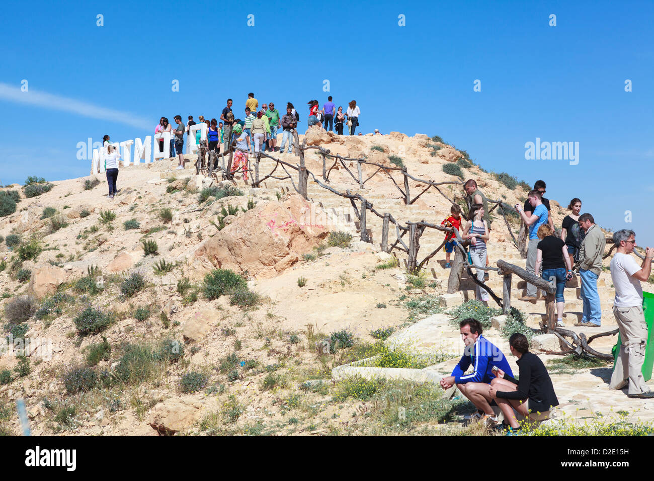 Tourists climb to the observation deck in the mountains. Matmata ...