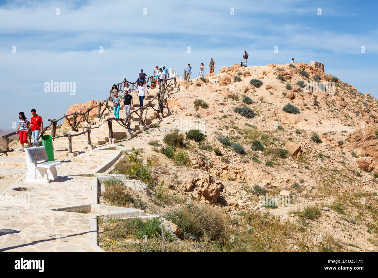 Tourists come down from the observation deck in the mountains. Matmata ...