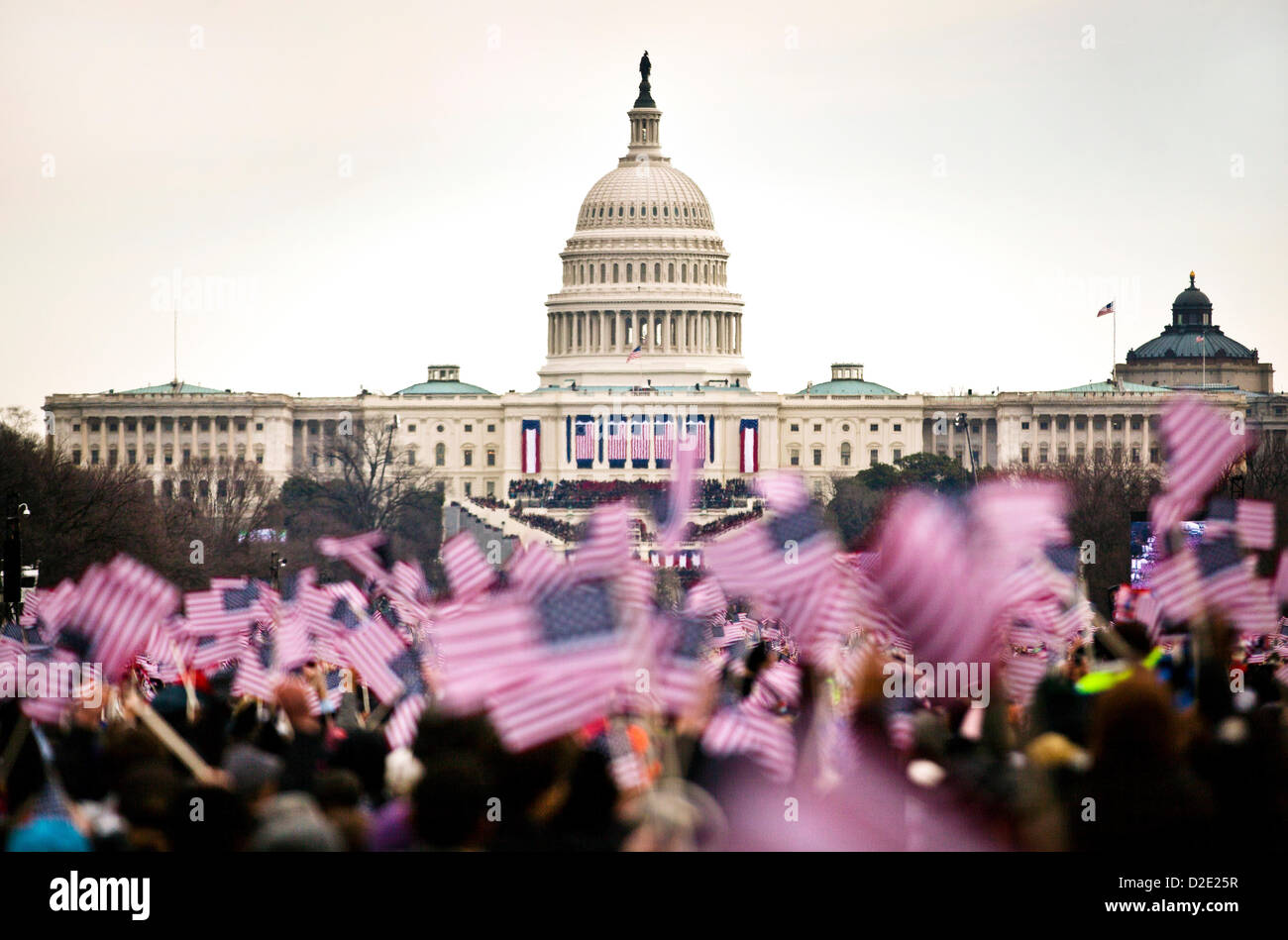 People wave American flags on the National Mall during the 57th ...