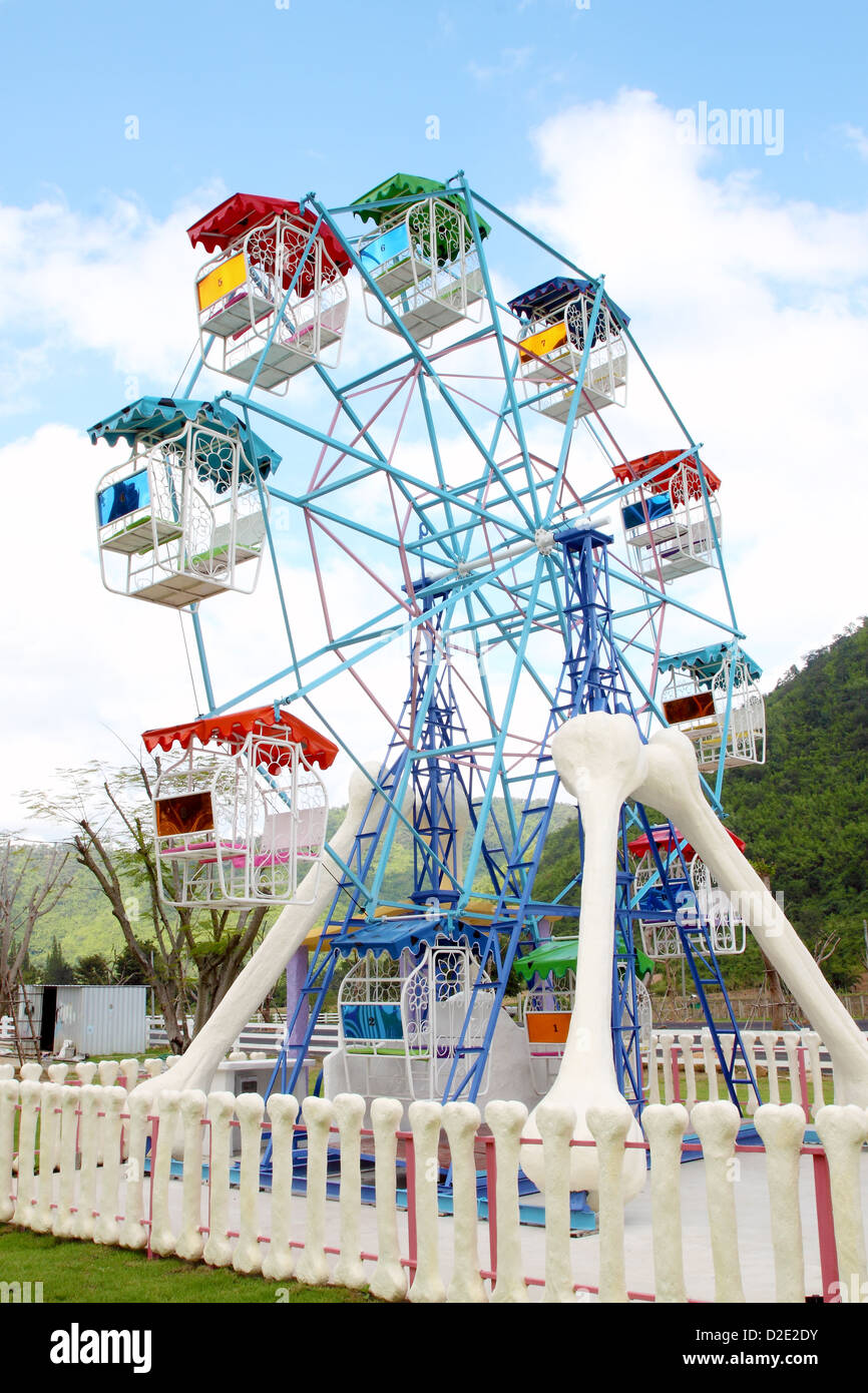 a colourful ferris wheel in the park Stock Photo - Alamy