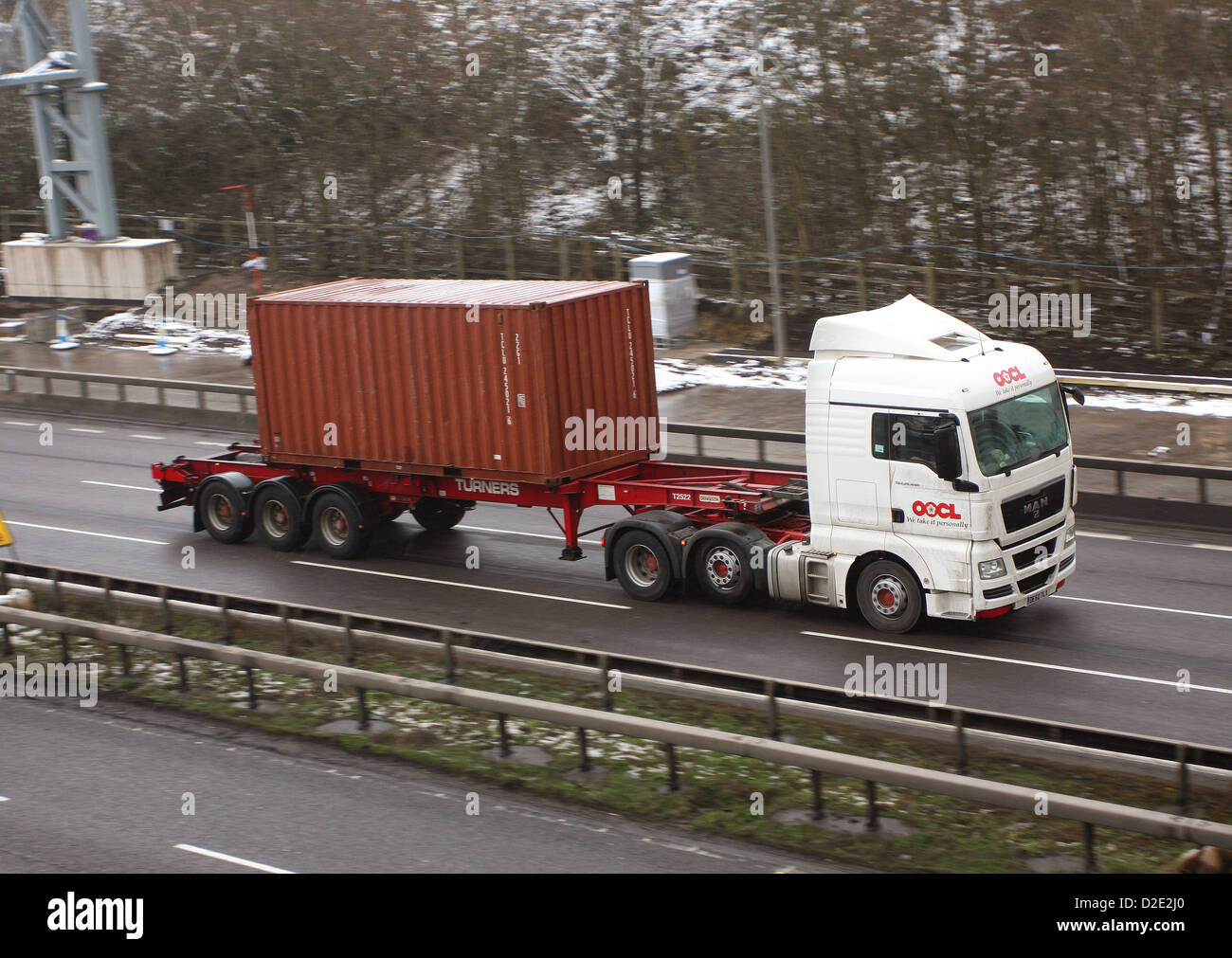 Container truck on the move, Commercial heavy traffic on the M4 ...