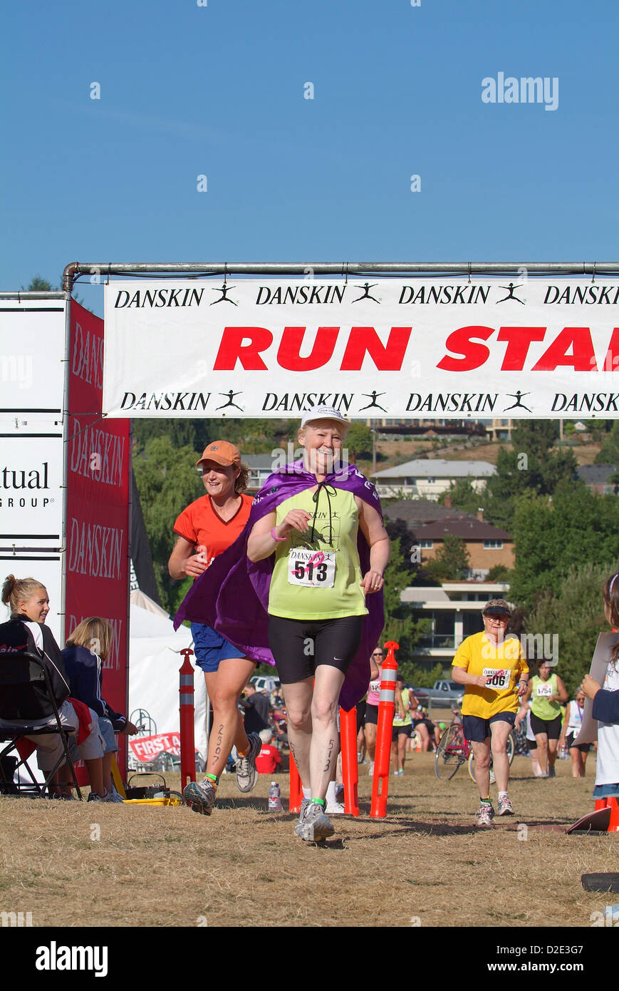 Senior woman running during the Danskin Triathlon Series in Seattle ...