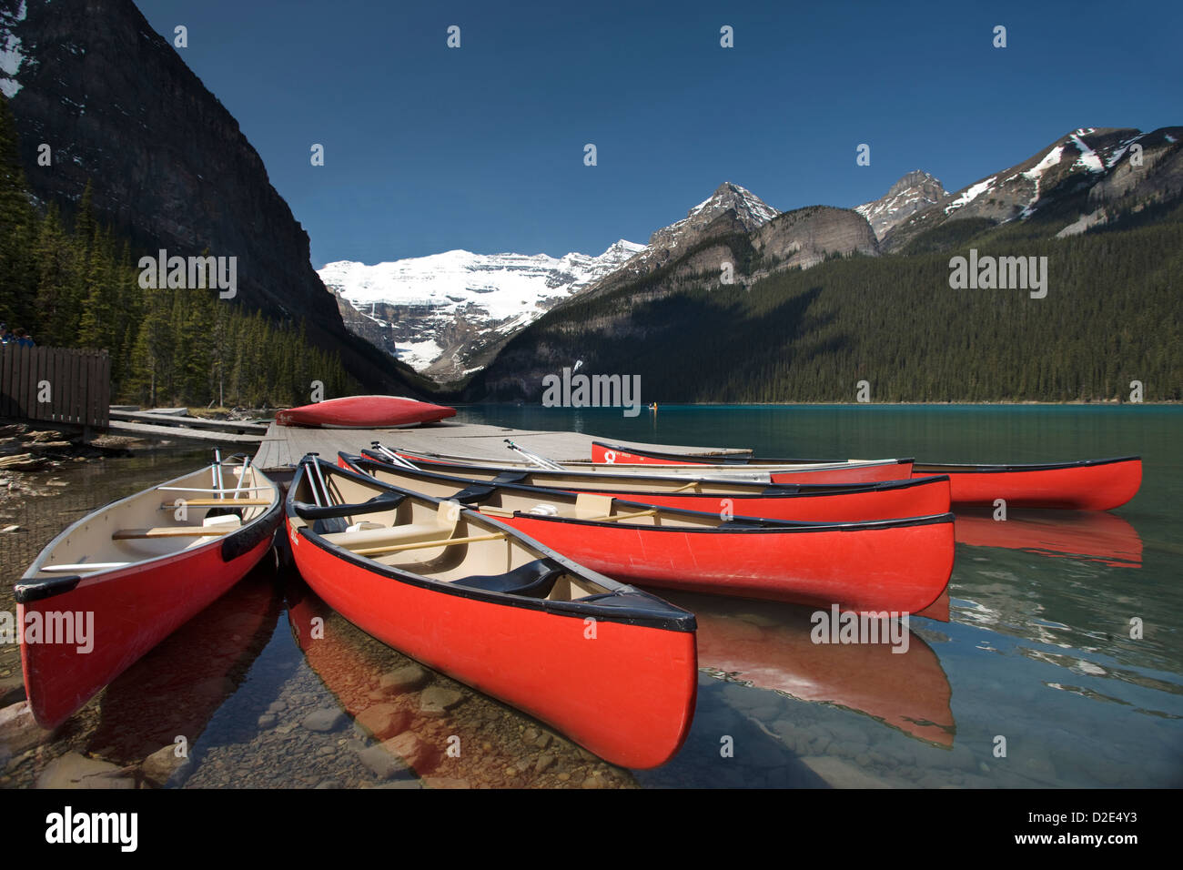 RED CANOES BOAT DOCK LAKE LOUISE VICTORIA GLACIER MOUNT VICTORIA BANFF ...