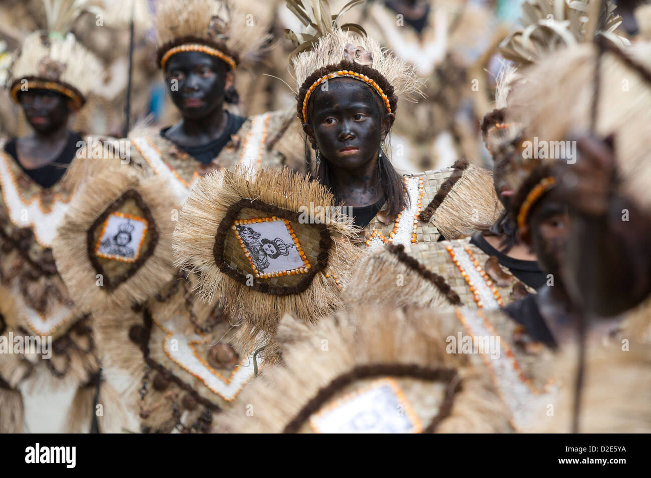 children in tribal costume,street dancing procession Ati-Atihan ...