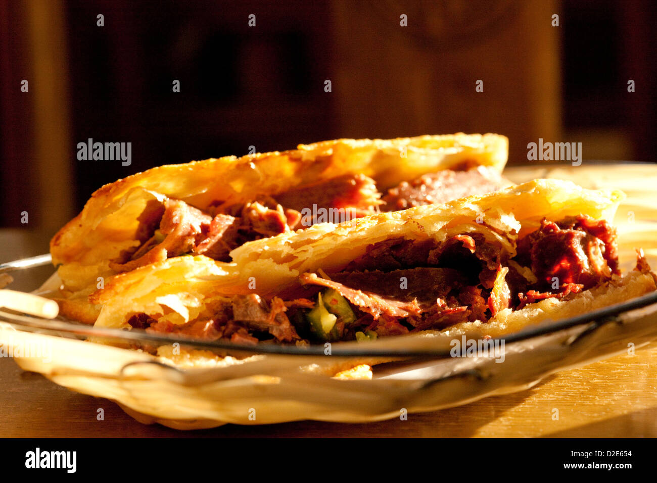 Chinese traditional food baked cake of donkey meat Stock Photo - Alamy