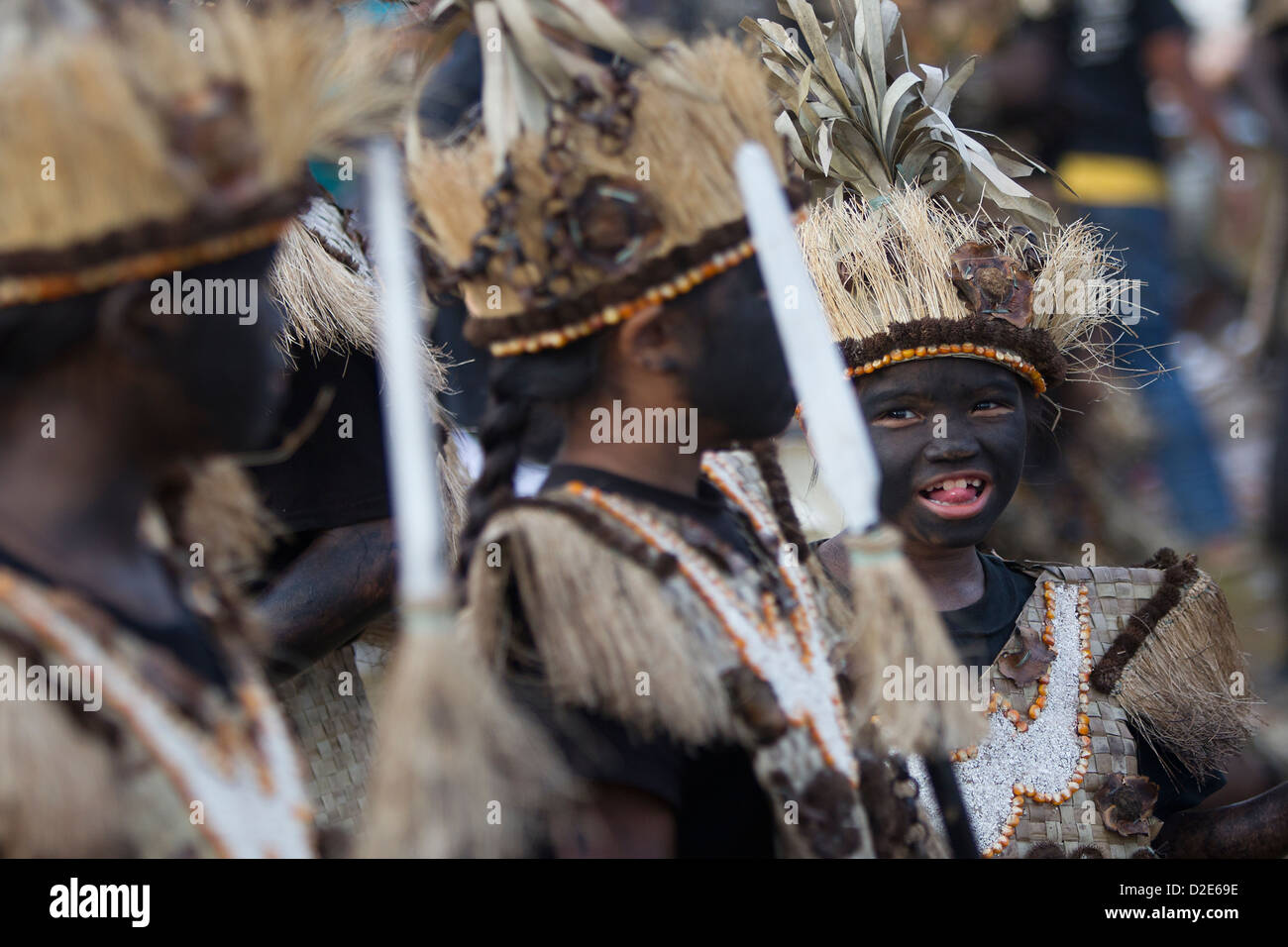 smiling child dressed in tribal costume, Ati-Atihan festival 2013 ...