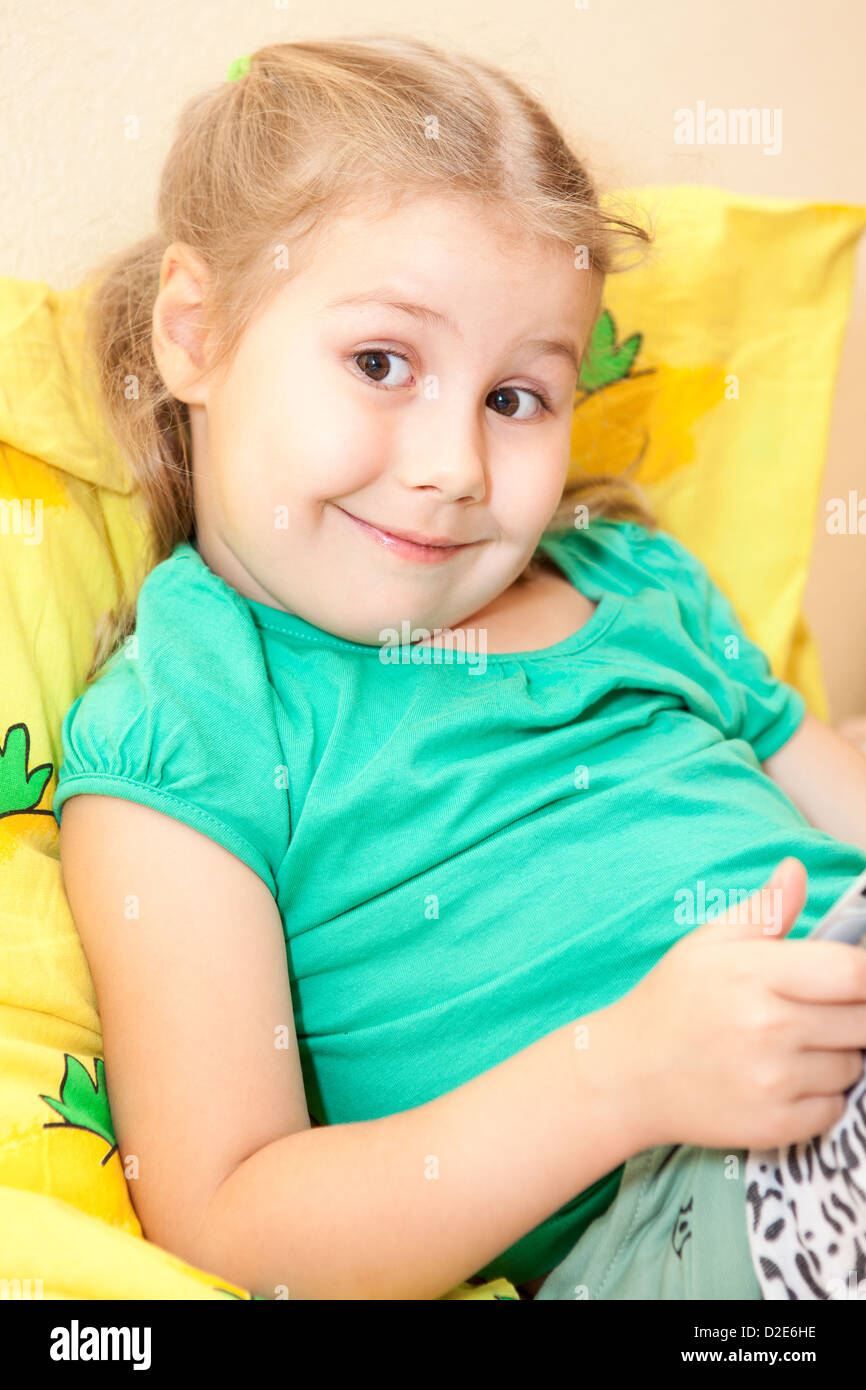 Preschool child smiling at the camera Stock Photo - Alamy